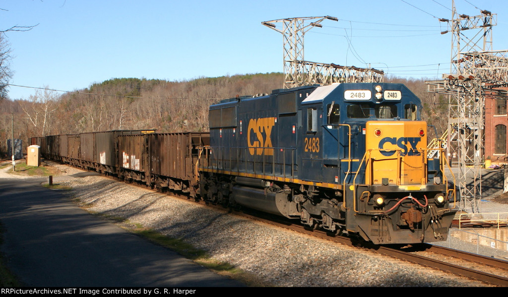 497 - Short ballast train EB past the Reusens transformer yard. W0 something or other